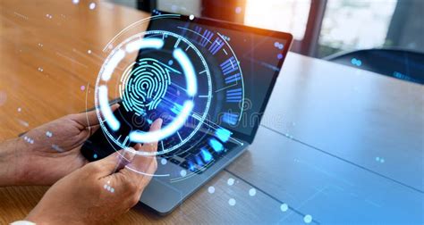 Man Hands With Phone And Laptop Fingerprint Interface Stock Image