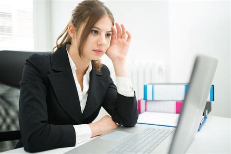 Premium Photo Businesswoman Looking At Her Computer Monitor