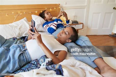 Female Friends Bed Photos And Premium High Res Pictures Getty Images