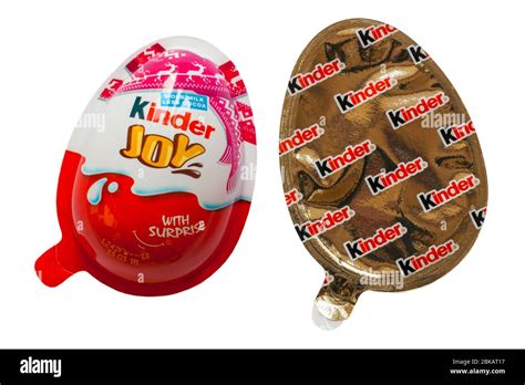 Kinder Joy Egg With Surprise Showing Both Halves Isolated On White