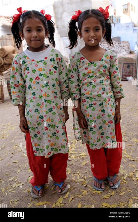 Cute Indian Twins Stock Photo Royalty Free Image Alamy