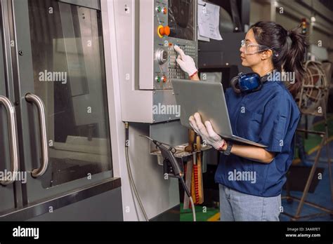 Engineer Women Working In Lathe Shop With Digital CNC Metal Lathe Milling Machine Expert