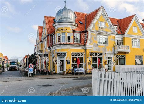Skagen City Street With Traditional Yellow Houses And Restaurants
