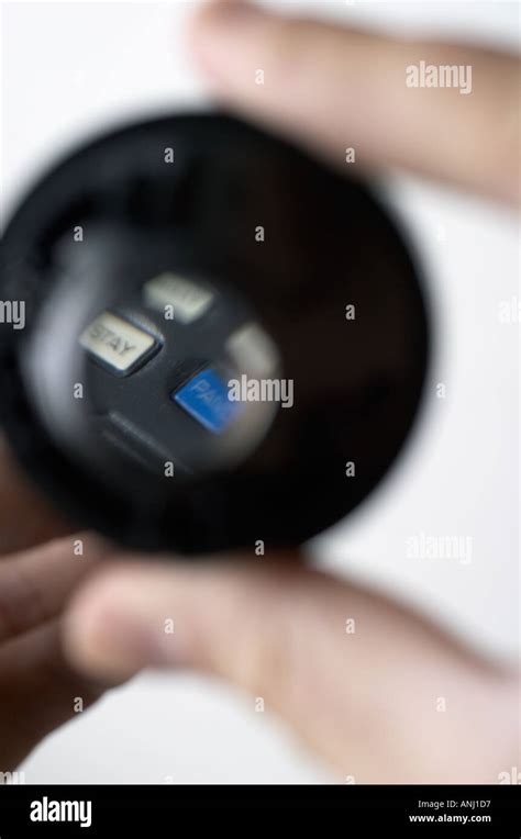 Man Holding Alarm Keypad Making A Choice Model Released And Property Released Image America