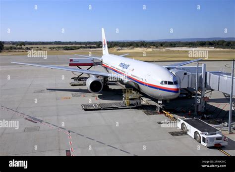 Malaysian Airlines Plane Preparing For Passengers To Board And Ground