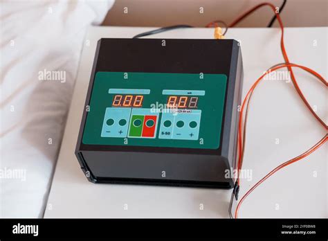 Digital Display Device With Dual Readouts And Control Buttons On A Minimalist Surface Stock