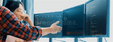 Group Of Professional Web Developer Discuss About Data Analysis Burgeoning Stock Image Image