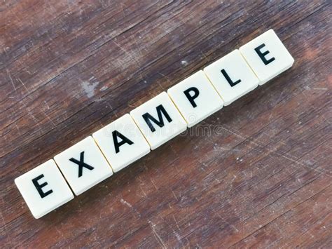 Diagonal Text Example Made Of Square Letter Tiles On Wooden Background Stock Photo Image Of