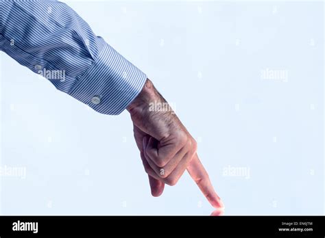 Man Pointing On Reflective Surface Stock Photo Alamy