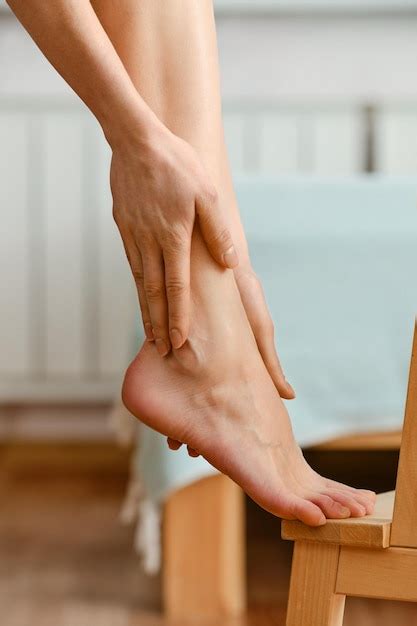 Premium Photo Closeup View Of Hands Massaging Foot