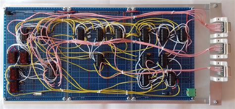 Transcendental Logic Circuit 6 Bit ÷ Ten Decimal Revisited