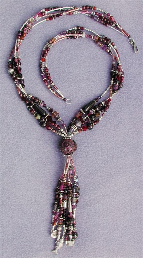 Rejiquar Garnet Multi Strand Necklace With Scrolled Focal