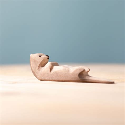 Sleeping Otter Wooden Figure Hand Carved And Natural Bumbutoys