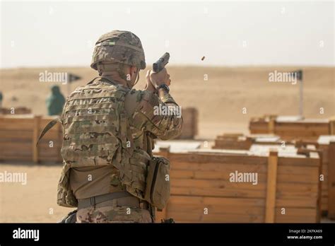 U S Army Soldiers From The 35th Infantry Division Conduct M17 And M4