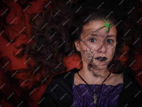 Premium Photo Portrait Of A Caucasian Teenage Girl With A Cobweb And A Spider On Her Face