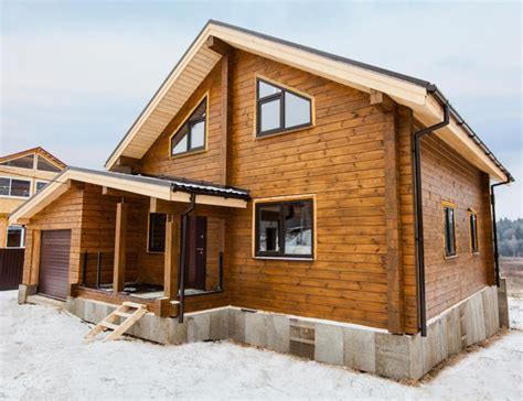 Дома из бруса - выбор материала, технология строительства ...