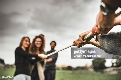 Tug Of War Hands Photos And Premium High Res Pictures Getty Images