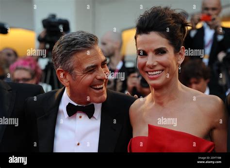 George Clooney And Sandra Bullock Attending The Gravity Premiere
