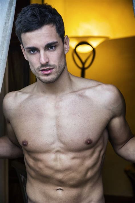 Shirtless Male Model Lying Alone On His Bed Stock Image Image Of