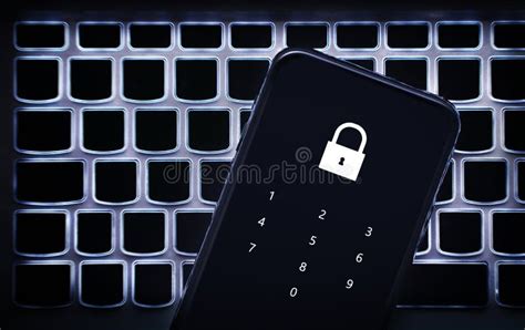 Data Privacy In Phone With Password Code Smartphone On Laptop Keyboard