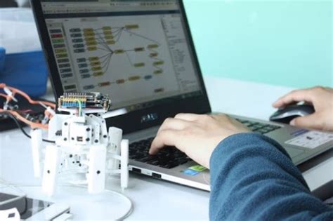 Worlds Smallest Programmable Robot Spider Influenced By… The Makers