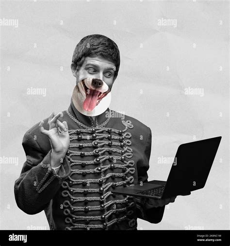 Hacker Scammer Smiling Young Man In Image Of Medieval Hussar Using Laptop Over Light