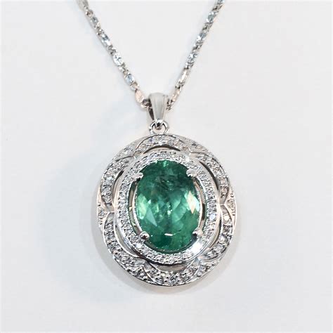 14k White Gold Emerald And Diamond Pendant Shown With White Gold 16