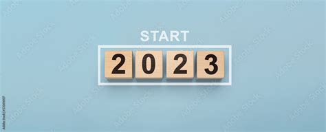Foto Stock 2023 New Year Start New Year 2023 With Wood Cube In Progress Bar Creative