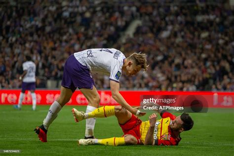 Anthony Roualt Of Toulouse Fc And Adrien Thomasson Of Rc Lens In