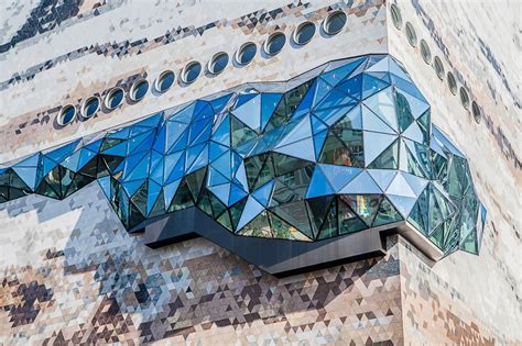 Futuristic Faceted Glass Glitters On An Old Looking Building By Oma Designs Ideas On Dornob