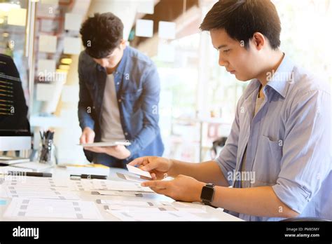 Programer Team Working Development Software With Ux Ui Project In Computer And Paper Project