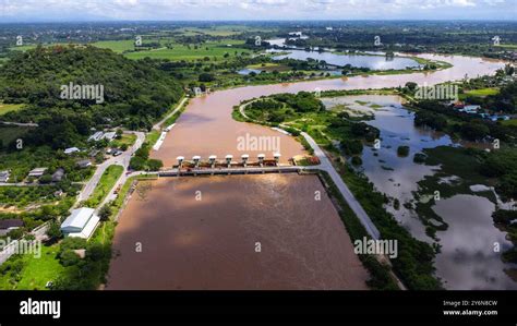 Aerial View Of The Dams Floodgates With Rapid Flow Of Water In The