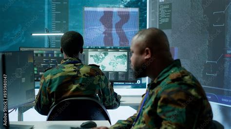 Us Soldiers In A High Tech Command Center Protecting Classified