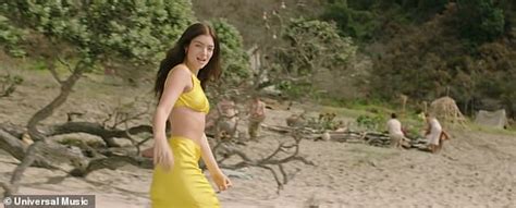Lorde Dances Around And Parties On Beach In Yellow Two Piece Dress In