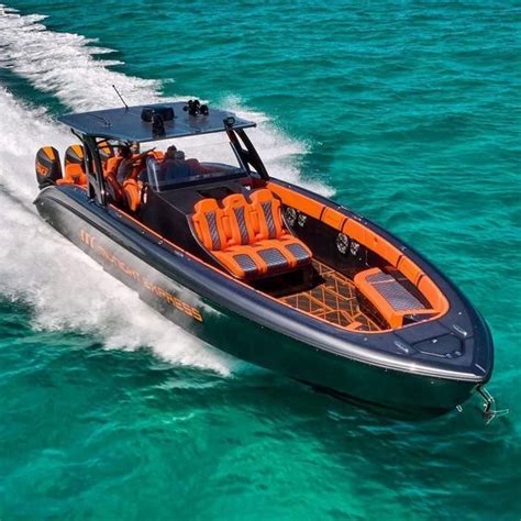 Orange And Black Speed Boat In The Water Best Boats For Tropical