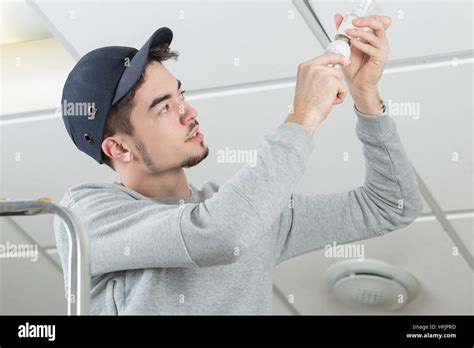 Man Changing Bulb Stock Photo Alamy
