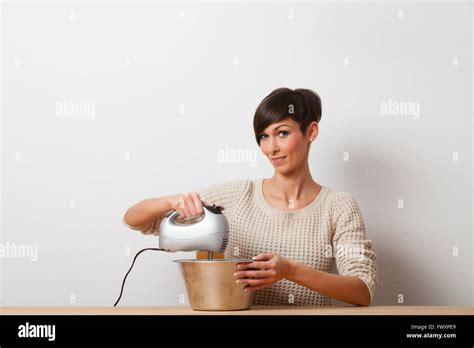 Woman With A Mixer Stock Photo Alamy