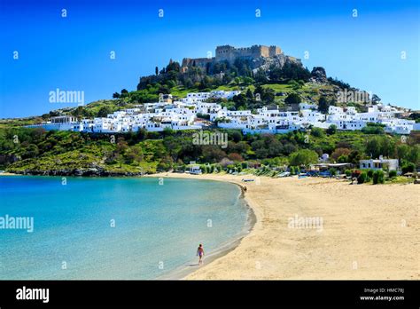 View Of Lindos Old Town Beach And Acropolis Rhodes Greece Stock