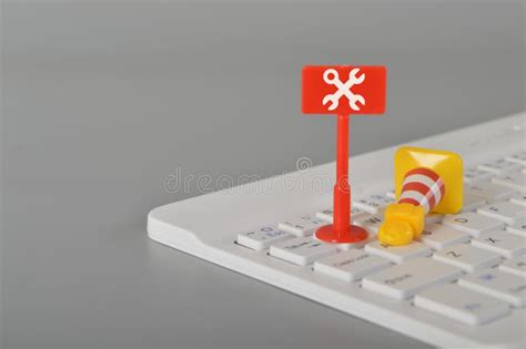 Computer Keyboard Traffic Cone And Wrench Symbol Website Maintenance