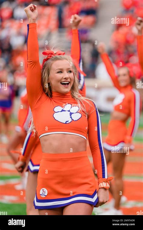 A Clemson Cheerleader Performs During An Ncaa College Football Game