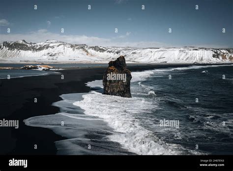 Dramatic Winter Landscape Of Icelandic Black Sand Beach Reynisfjara