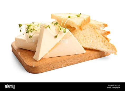 Board With Processed Cheese Bread And Herbs On White Background Stock