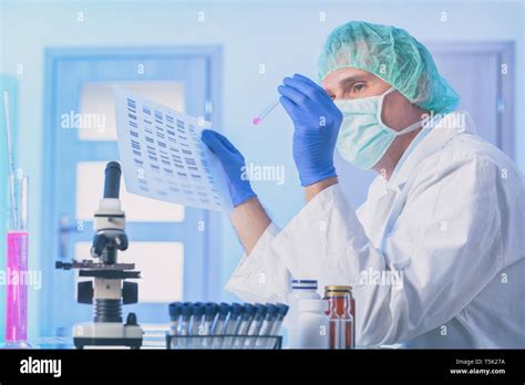 Scientist Analizing DNA Sequence In The Modern Laboratory Stock Photo Alamy