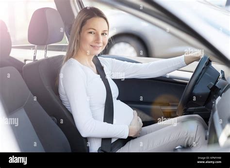 Pregnant Woman Driving Her Car Stock Photo Alamy