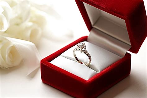 Red Wedding Box Of A Engagement Ring Inside And On A White Table Background Wedding Diamond
