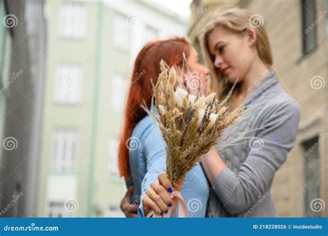Same Sex Relationships Happy Lesbian Couple With Dried Flowers Stock