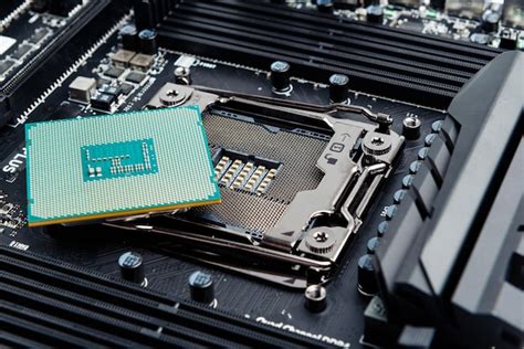 Premium Photo Cpu Socket And Processor On The Motherboard Before Installation Processor