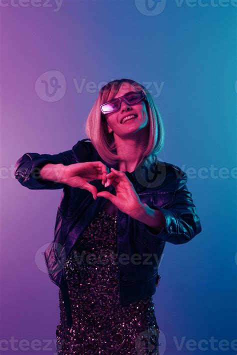 Lovely Beautiful Blonde Woman In Leather Jacket Sparkly Dress Trendy
