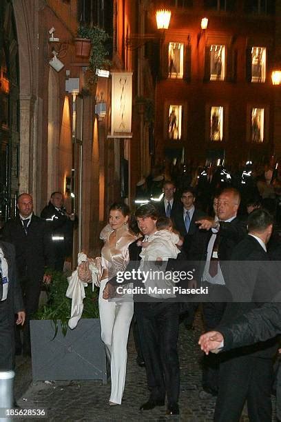 Tom Cruise His Wife Katie Holmes And Their Daughter Suri Arrive At