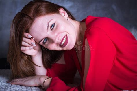 Beautiful And Woman With Red Hair And Dressed In A Red Dress Stock Image Image Of Model Cute